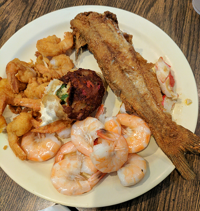 A seafood feast that would make Neptune himself jealous. That golden-fried catfish is the star of an ocean-to-plate symphony.