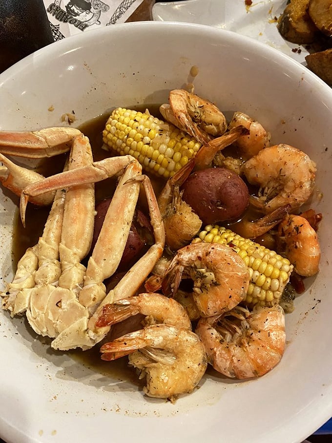 Not all heroes wear capes&mdash;some arrive in bowls with crab legs, shrimp, corn, and potatoes swimming in seasoned broth that demands to be sopped up.