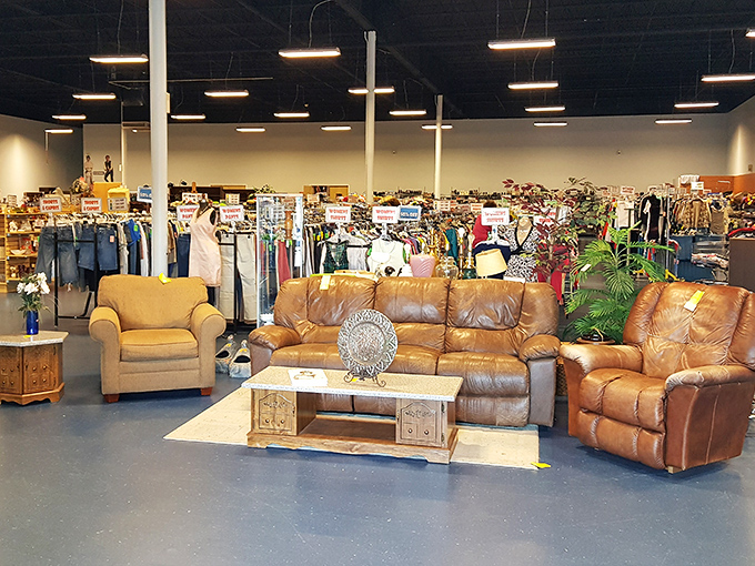 Leather recliners and coffee tables waiting for their second act. In the theater of thrift, these are the veteran performers.