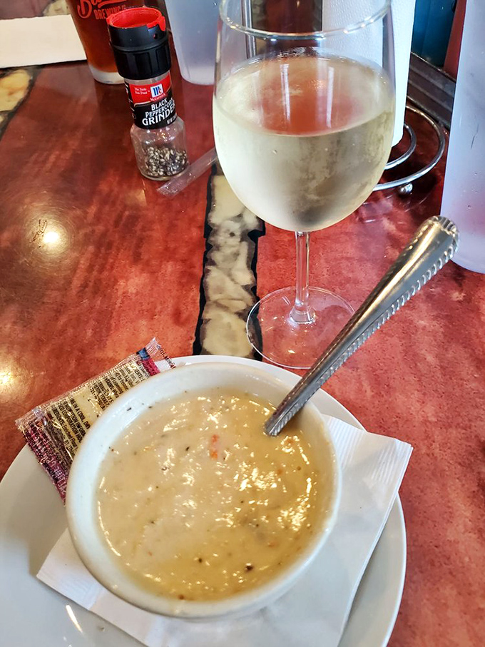 The legendary she-crab soup arrives like liquid velvet, with chunks of sweet crab swimming in buttery bliss. This isn't soup—it's an edible hug.