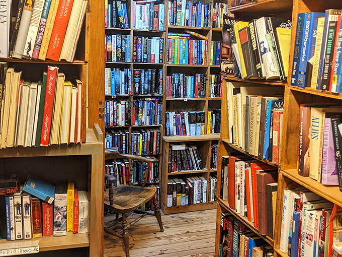 Wooden shelves stretch toward hidden corners, creating those perfect "just one more aisle" moments that turn quick visits into afternoon-long adventures. 