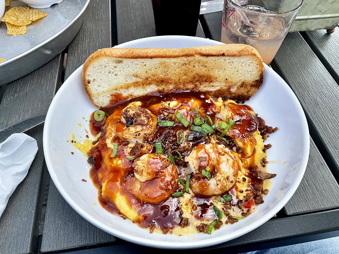 Shrimp and grits that would make a Southerner weep with joy&mdash;plump crustaceans nestled on creamy cornmeal heaven with a slice of crusty bread for sopping.