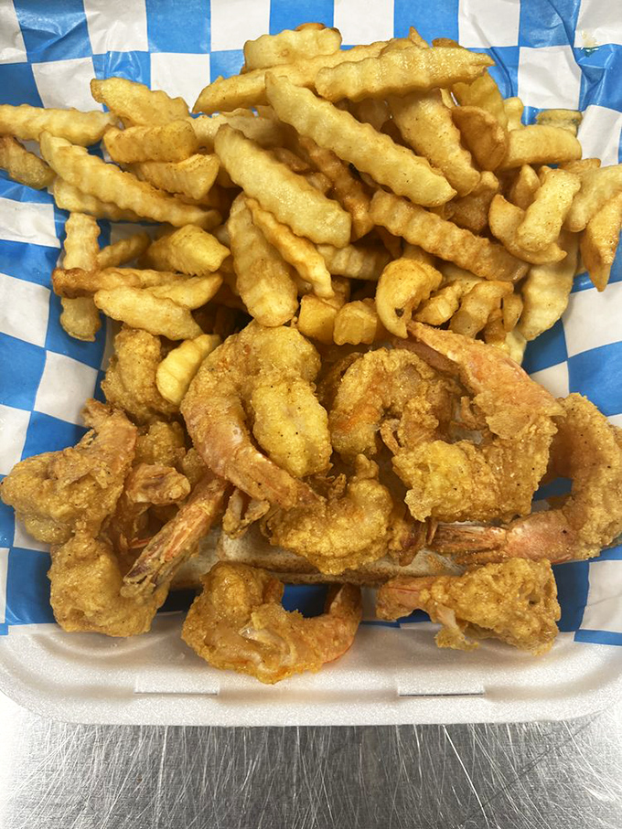 Golden-battered shrimp nestled against crispy fries&mdash;a duo that proves landlocked Indiana can deliver seafood worthy of a coastal detour.
