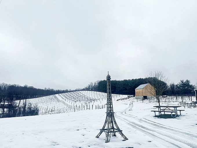 Winter transforms the vineyard into a snow globe scene, complete with a miniature Eiffel Tower. Proof that wine country magic happens in every season.