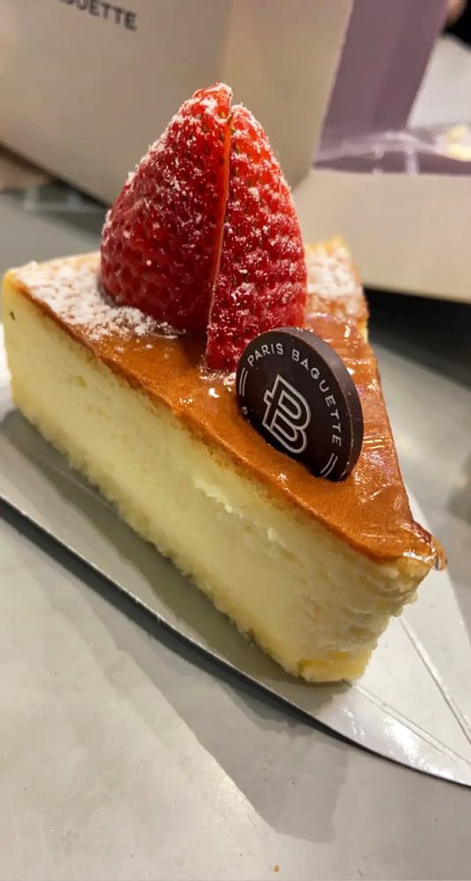 This soufflé cheesecake topped with a perfect strawberry might just be worth crossing state lines for – creamy decadence that somehow manages to feel light as a cloud.