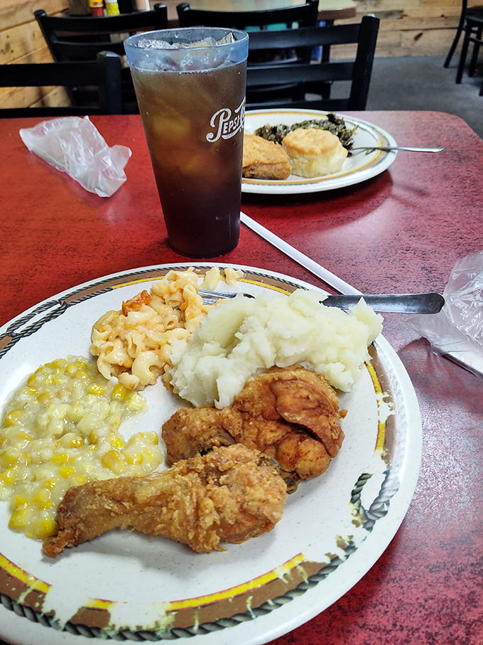 Southern comfort on a plate: golden fried chicken, creamy mac and cheese, and mashed potatoes that could make a grown adult weep with joy.