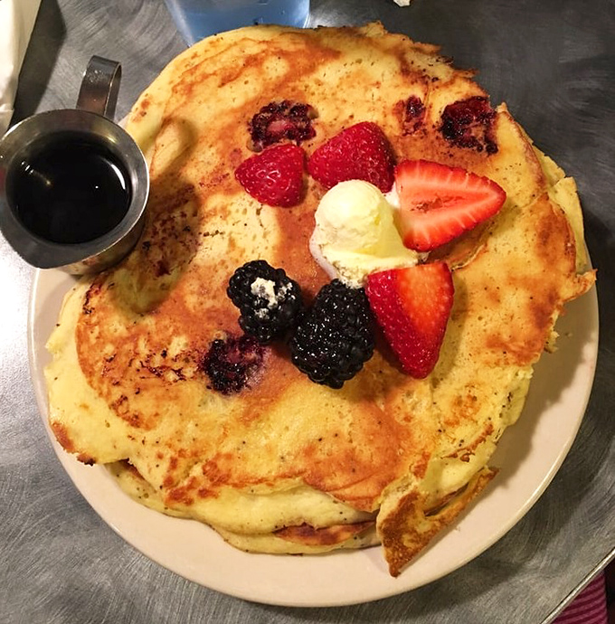Pancake perfection doesn't happen by accident. This golden disc topped with fresh berries and a melting pat of butter is breakfast's answer to the sunset.