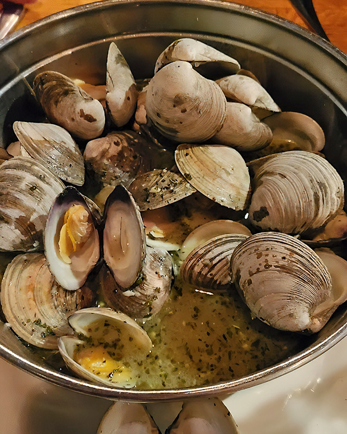 These steamed clams aren't just food&mdash;they're an event. Plump, briny treasures bathing in their natural juices, waiting for their butter baptism.