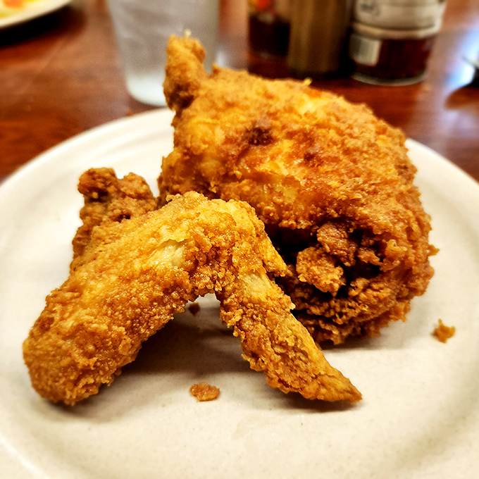 Golden-brown perfection on a plate. This isn't just fried chicken&mdash;it's edible Mississippi history with a side of culinary magic.