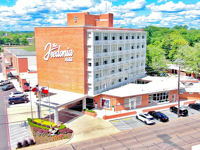 The Fredonia Hotel stands as a mid-century modern oasis amid historic brick buildings. Think "Mad Men" meets East Texas hospitality.