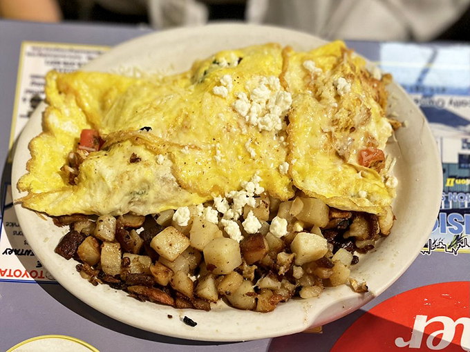 Not all heroes wear capes; some come wrapped in perfectly cooked eggs with melty cheese and crispy home fries.