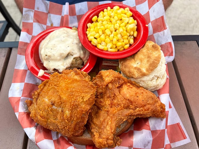 Golden-brown perfection meets buttery biscuit and sweet corn. This plate doesn't just feed the stomach&mdash;it nourishes the soul with every bite.