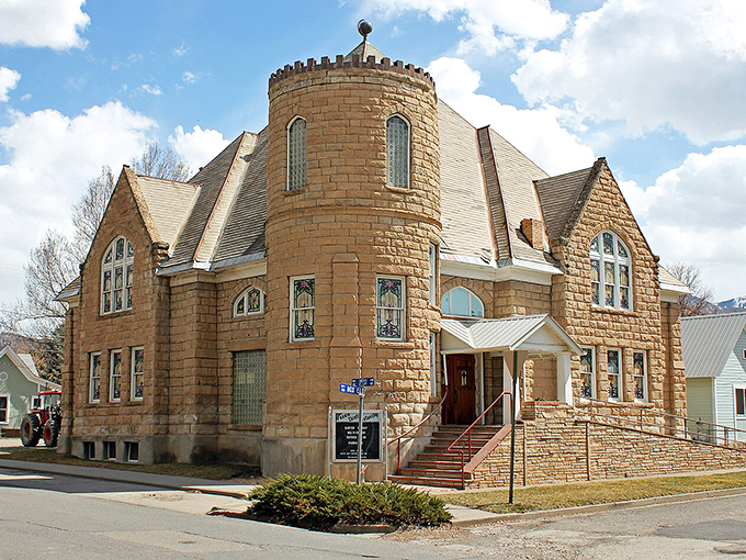 The historic First Christian Church stands as Paonia's architectural crown jewel, its sandstone tower reaching skyward like the ambitions of its founders.