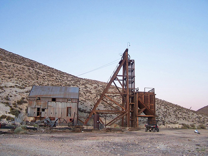 Mining history preserved in weathered wood and rusted metal&mdash;this headframe once guided miners to silver veins below and now stands as a monument to Tonopah's glittering past.