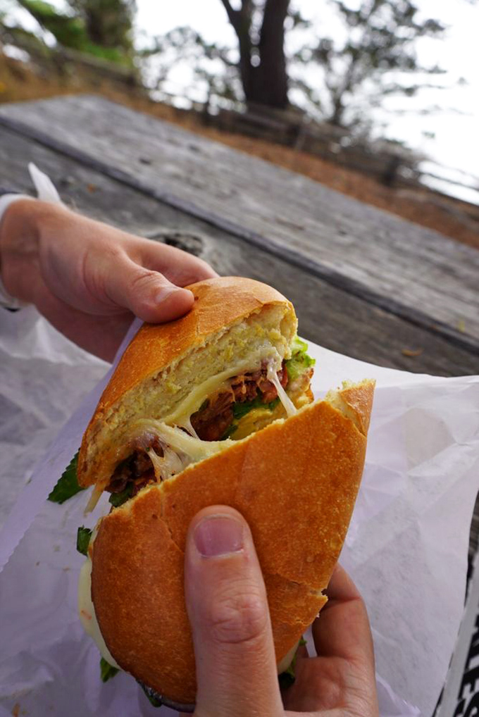 That moment when your sandwich demands to be photographed before eaten. This golden-crusted beauty makes car dashboard dining feel like a Michelin-starred experience.
