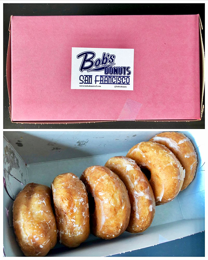 Pink box treasures lined up like soldiers ready for duty. These glazed beauties aren't just breakfast&mdash;they're an edible hug.