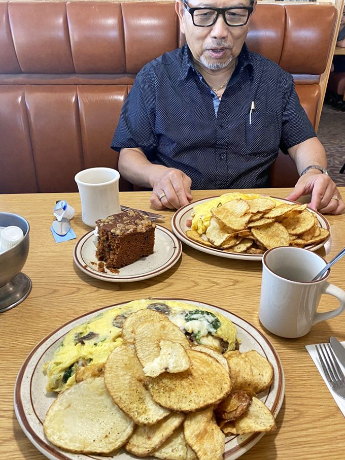 Breakfast platters that could double as weight training equipment &ndash; this spread with chocolate cake on the side is how champions start their day.