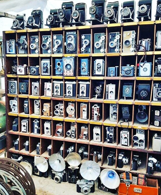 Camera collectors, rejoice! This meticulously organized display of vintage photography equipment could make even digital natives swoon with nostalgia.