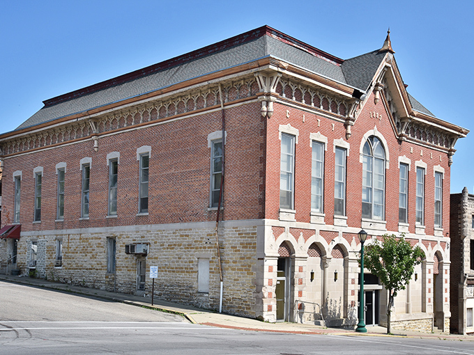 City Hall or architectural time capsule? This red brick beauty shows that municipal buildings were once built to inspire, not just house paperwork.