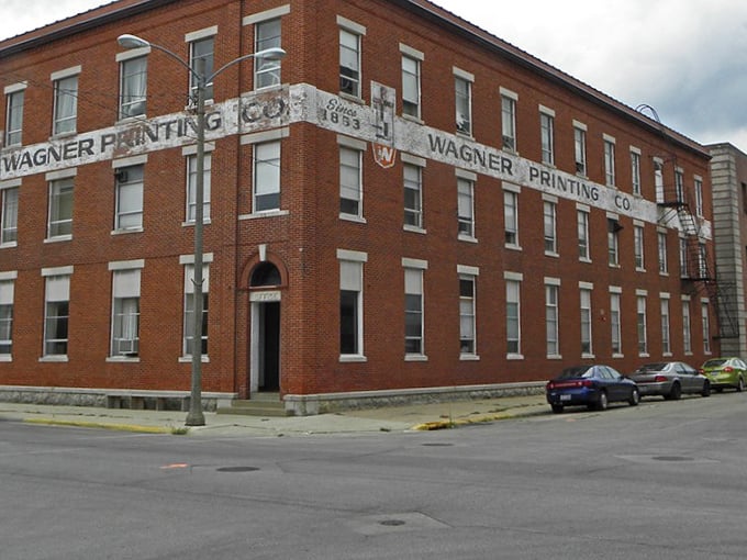 The Wagner Printing building has witnessed more Freeport history than your grandmother's photo albums. Solid brick craftsmanship that's outlasted eight-track tapes and dial-up internet.