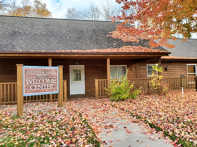 Autumn transforms the Welcome Center into a scene worthy of a calendar cover. Those fallen leaves aren't making a mess&mdash;they're creating nature's red carpet.