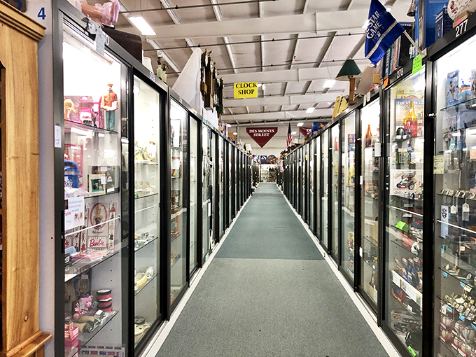 The corridor of curiosities stretches toward infinity, each glass case a portal to someone else's memories waiting to become yours. 