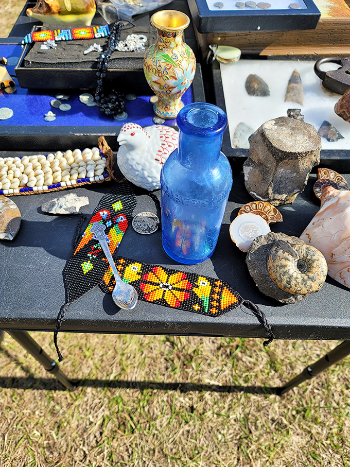 A tabletop museum of curiosities where beaded craftsmanship meets vintage glassware. One person's forgotten keepsakes become another's conversation pieces.