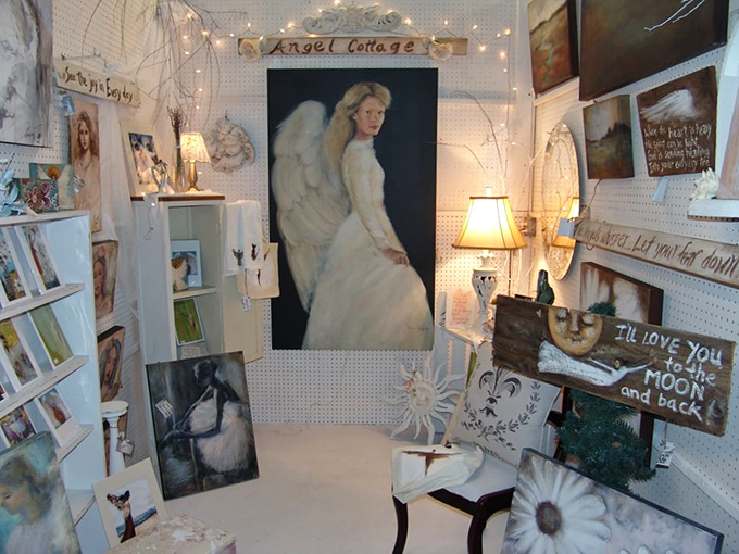 The "Angel Cottage" booth creates a heavenly escape where vintage art and inspirational pieces come together in a dreamy white wonderland.