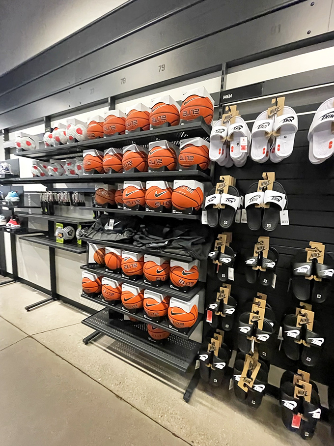 Basketball heaven or sneaker paradise? At the Nike outlet, sports enthusiasts find themselves contemplating life's most important question: "Do I need another ball?"