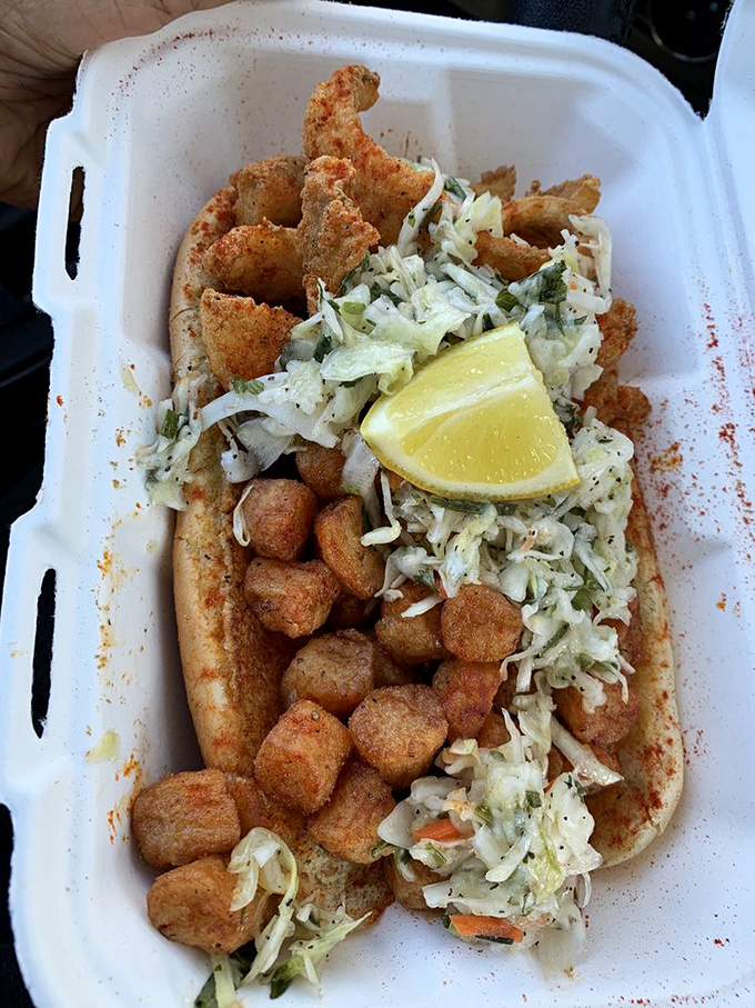 This shrimp roll isn't just a sandwich, it's a philosophy: perfectly fried seafood, bright slaw, and a squeeze of lemon. Simplicity that speaks volumes.
