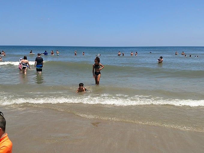 Beach physics 101: The joy of ocean waves is directly proportional to how many people you're sharing them with. Sandbridge's math checks out.