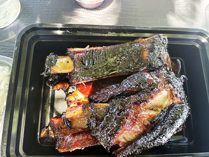 These beef ribs aren't just cooked&mdash;they're transformed. That bark is like nature's candy, a caramelized crust protecting meat so tender it practically surrenders to your fork.