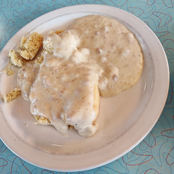 Biscuits and gravy so good they'd make your grandmother both jealous and proud. That pepper-speckled gravy blanket is comfort in its purest form.