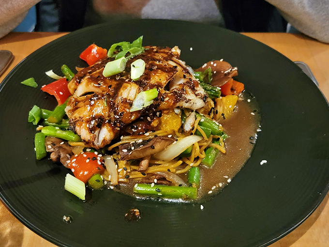 The Hoisin Blackcod dances with colorful vegetables in a symphony of flavors. This isn't just dinner; it's edible artwork with an Asian-inspired twist.