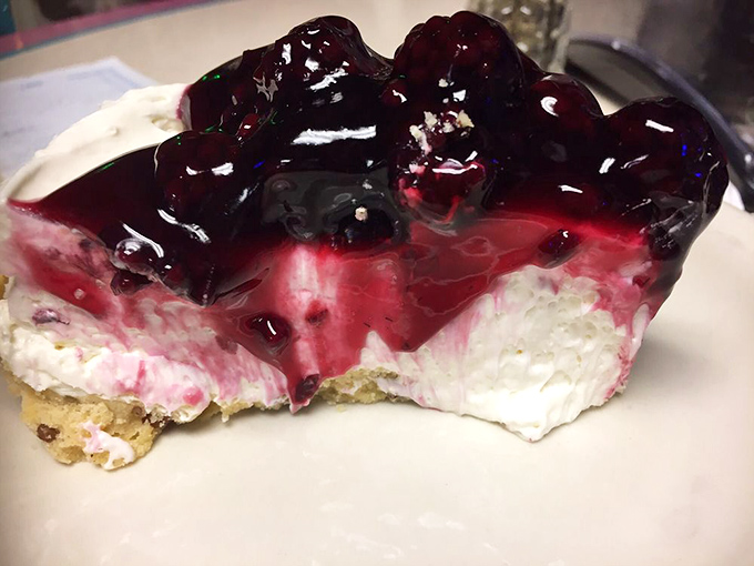 Blackberry cheesecake that makes time stand still – a perfect balance of sweet fruit and creamy decadence worth every calorie.