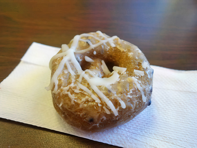This isn't just a blueberry cake donut; it's edible architecture with personality. The drizzle isn't decoration&mdash;it's the signature on a masterpiece.