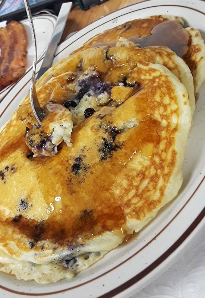 These blueberry pancakes aren't just breakfast, they're an edible hug&mdash;fluffy, golden, and bursting with berries that pop like tiny flavor bombs.