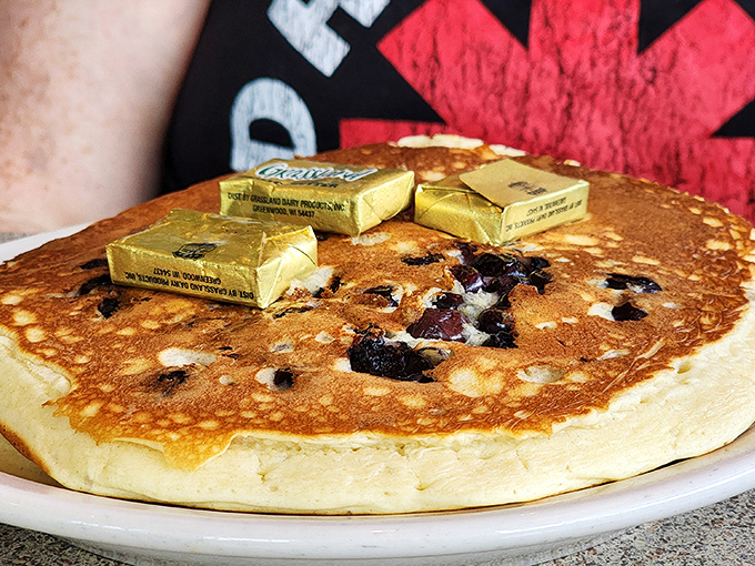 Blueberry pancakes topped with butter squares like golden thrones&mdash;the breakfast equivalent of winning the lottery without having to share it with relatives.