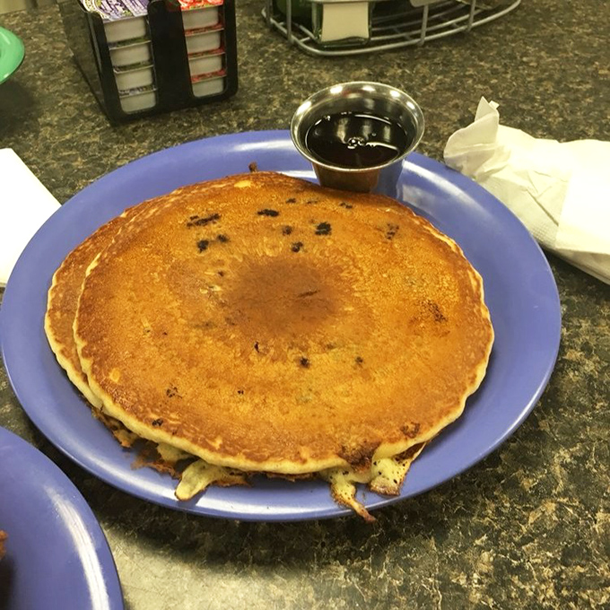 Golden-brown pancake perfection that would make your grandmother both proud and jealous. That little cup of syrup is about to embark on a delicious journey.