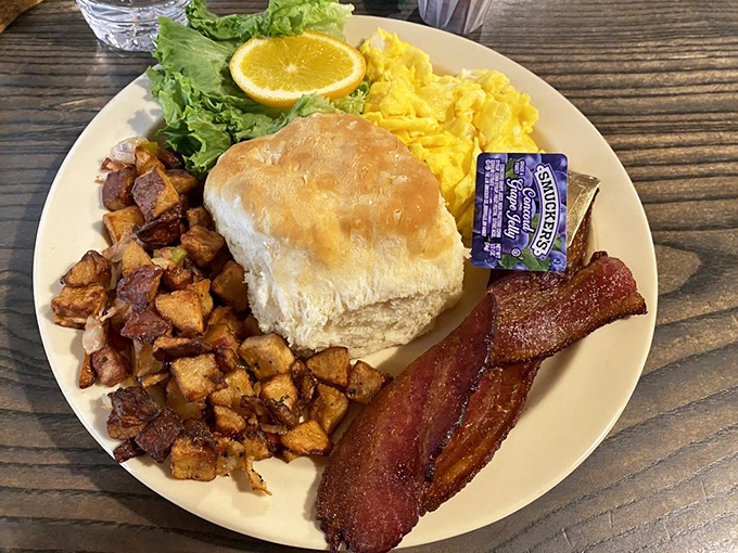 Breakfast perfection on a plate&mdash;golden hash browns, fluffy eggs, and bacon that would make even your cardiologist consider a cheat day.