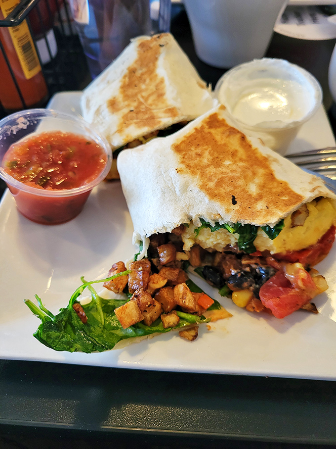 Breakfast burritos shouldn't be this photogenic! Stuffed with colorful veggies and protein, served with fresh salsa that'll wake up your taste buds.