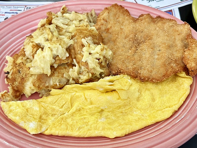 This breakfast platter doesn't just start your day—it launches it into orbit with perfectly golden hash browns and a tenderloin that means business.