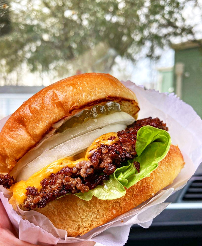 That perfect burger moment when the cheese melts just right, the patty glistens, and you realize lunch might actually be the highlight of your day.