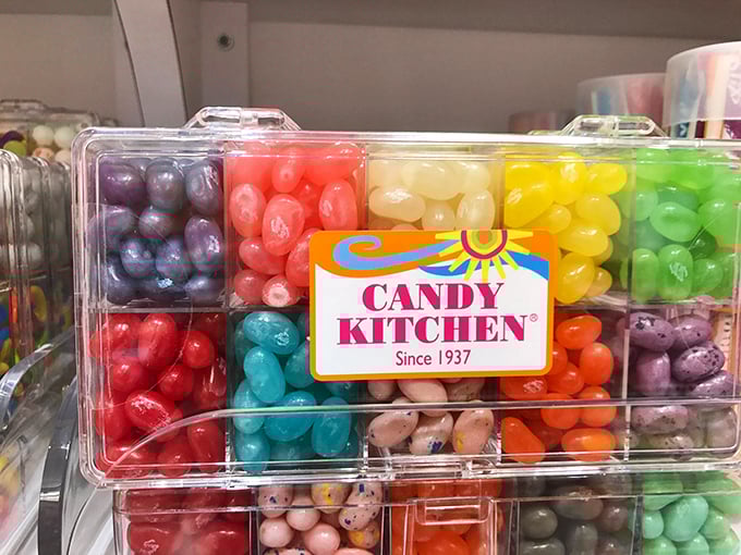 Rainbow jellybeans lined up like edible jewels, proving Mother Nature missed a trick when designing actual fruit.