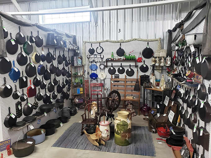 Cast iron paradise! This booth's wall-to-wall collection would make your grandmother swoon and your forearms ache just looking at it. 