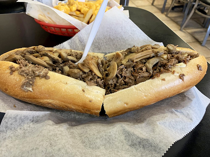 Behold the star of the show! Thinly chopped steak and mushrooms spill from a perfectly golden roll &ndash; this isn't a meal, it's an event.