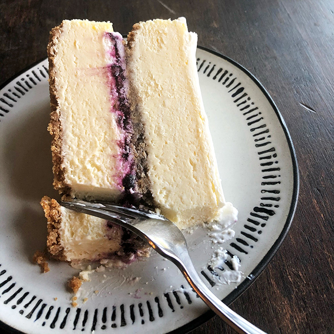 Behold, the holy grail of Wisconsin dairy transformation. This berry-swirled cheesecake slice isn't just dessert&mdash;it's an edible work of art worth crossing county lines for.