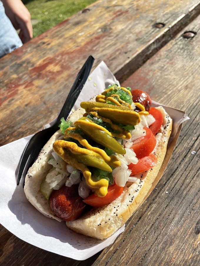This Chicago Dog isn't just lunch&mdash;it's architecture. A skyscraper of toppings perfectly balanced on an Angus beef foundation.