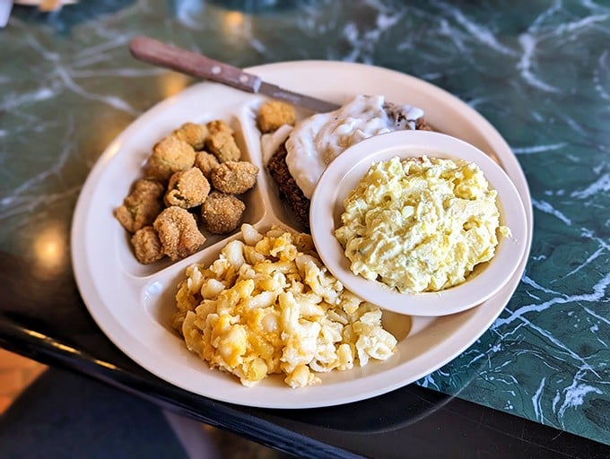 Breakfast perfection on a plate! Golden fried okra, hash browns that glisten with just the right amount of crispness, and eggs that define morning bliss.