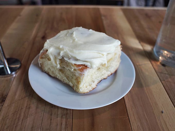 This isn't just a cinnamon roll; it's a spiral-shaped revelation that makes you question why you ever settled for those mall food court imposters.